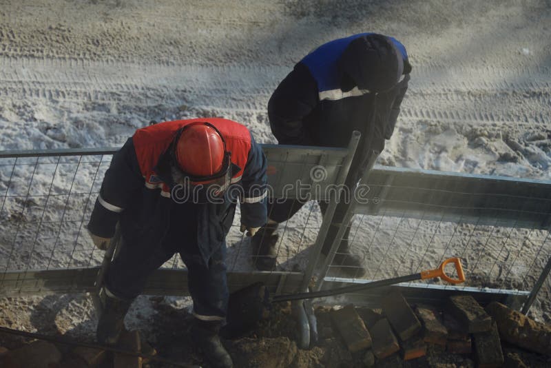 Working Men in the Form of Standing Around a Sand Pit Stock Photo ...