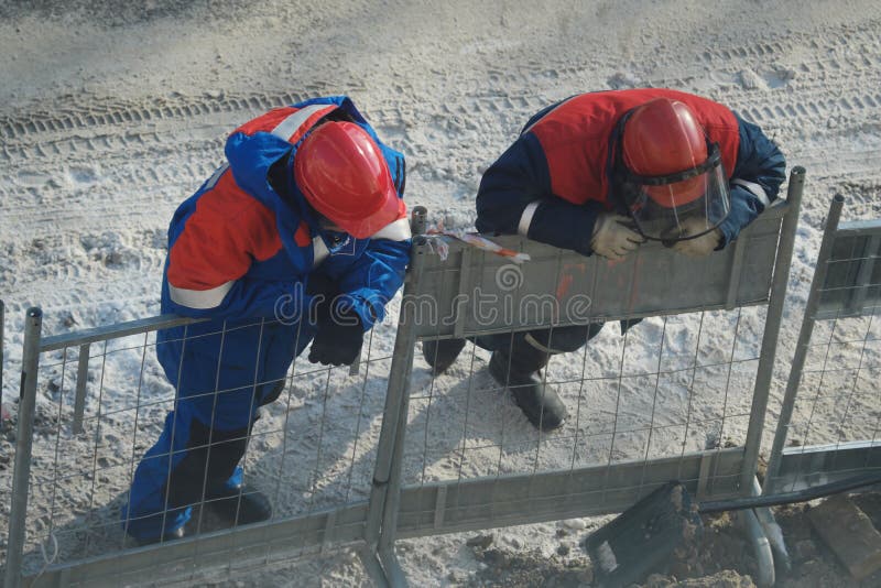 Working Men in the Form of Standing Around a Sand Pit Stock Photo ...