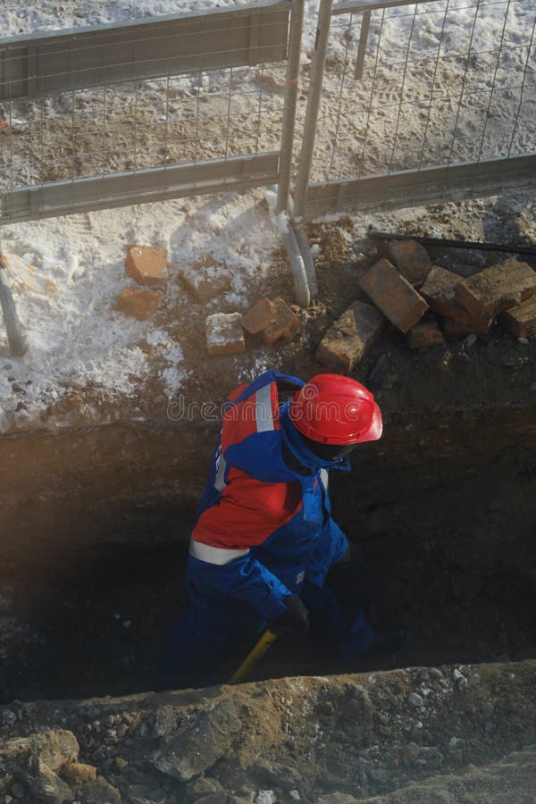 Working Men in the Form of Standing Around a Sand Pit Stock Photo ...