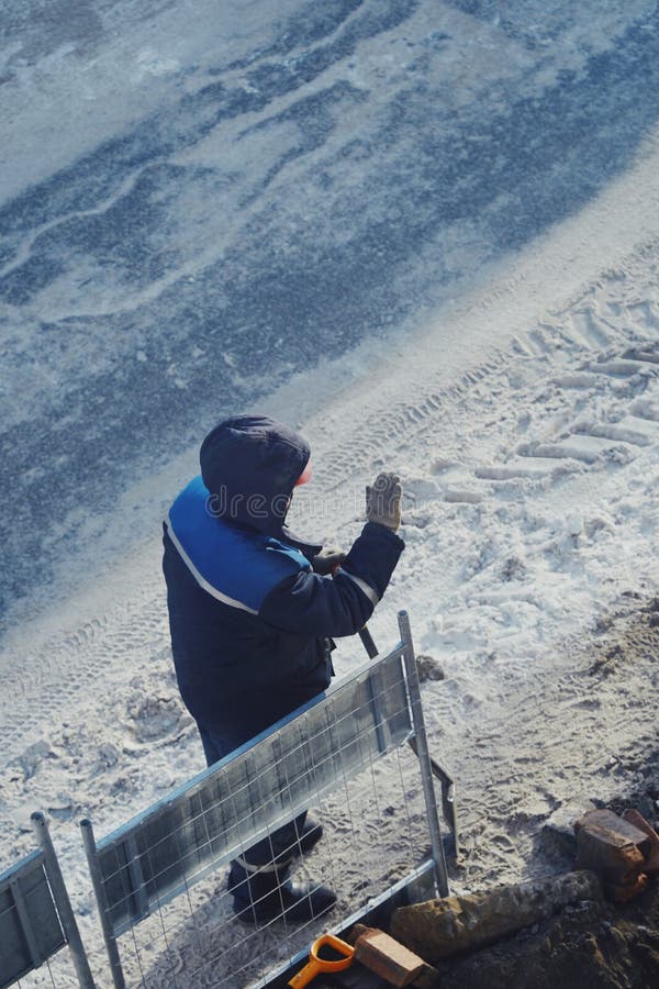 Working Men in the Form of Standing Around a Sand Pit Stock Photo ...