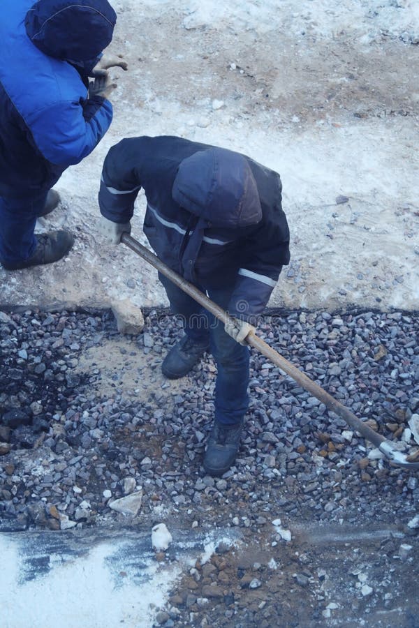 Working Men in the Form of Standing Around a Sand Pit Editorial Photo ...