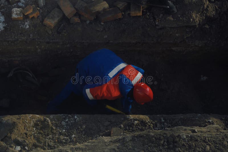 Working Men in the Form of Standing Around a Sand Pit Stock Photo ...