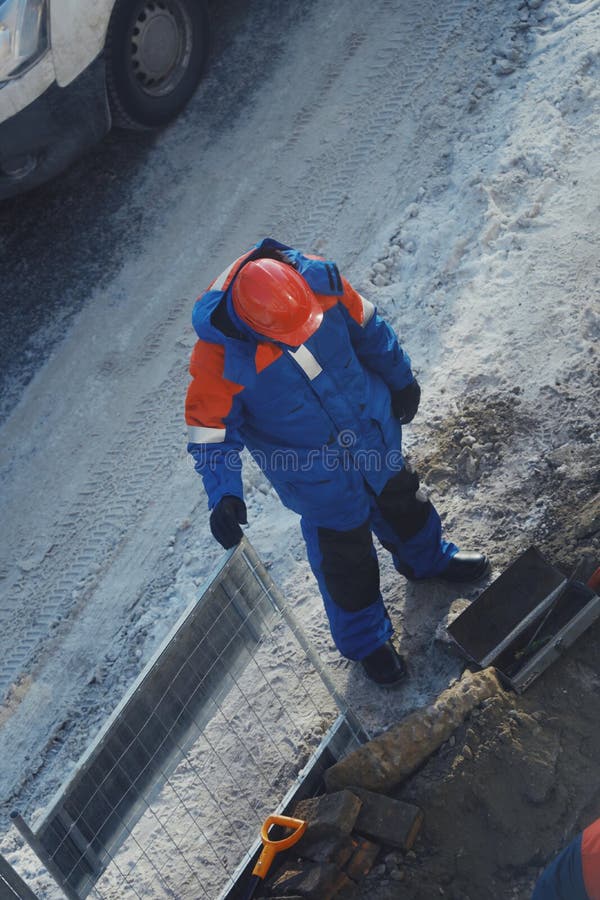 Working Men in the Form of Standing Around a Sand Pit Stock Photo ...