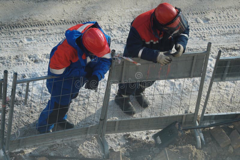 Working Men in the Form of Standing Around a Sand Pit Stock Image ...