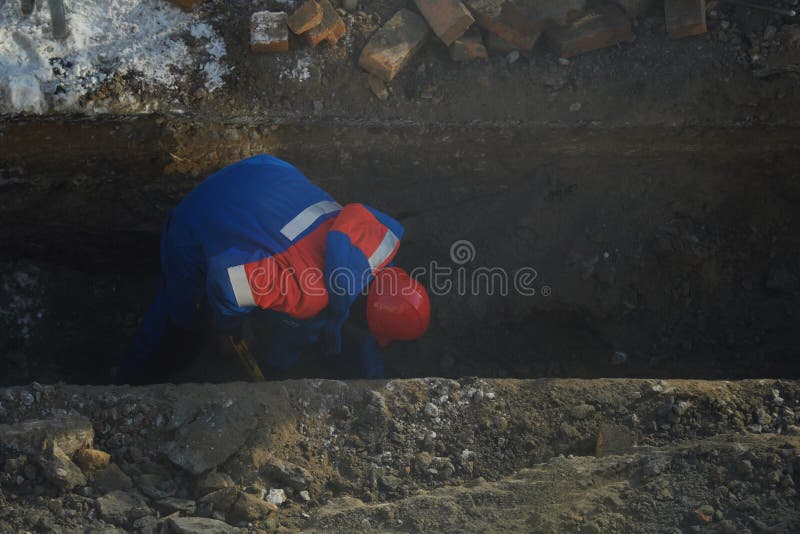 Working Men in the Form of Standing Around a Sand Pit Stock Photo ...