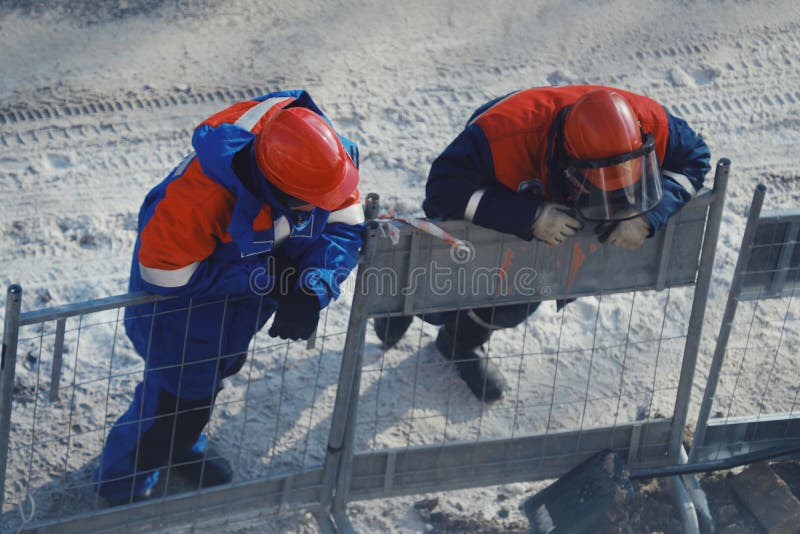 Working Men in the Form of Standing Around a Sand Pit Stock Photo ...