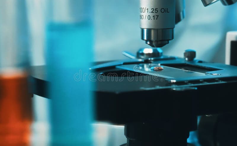 Working with microscope stock image. Image of experiment - 263352607