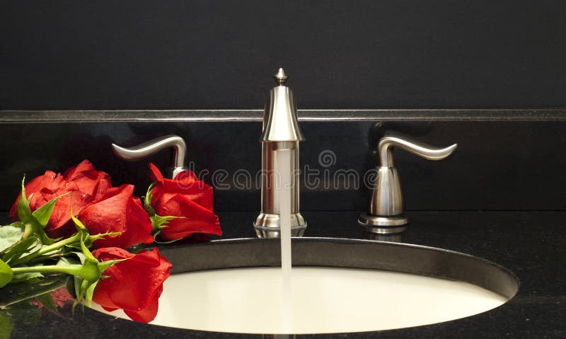 Working Mixer Tap with a Few Roses on a Counter Stock Image - Image of ...
