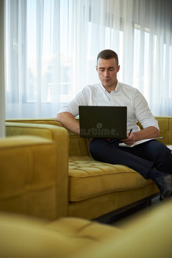 Working in Modern Office Setting on Laptop Device Stock Image - Image ...