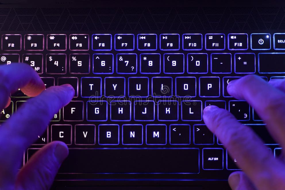 Working on a Neon Computer Keyboard with Colored Backlighting. Computer ...