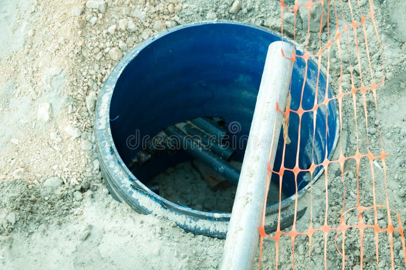 Working on the New Sewage Manhole Drainage System on the Street. Stock ...