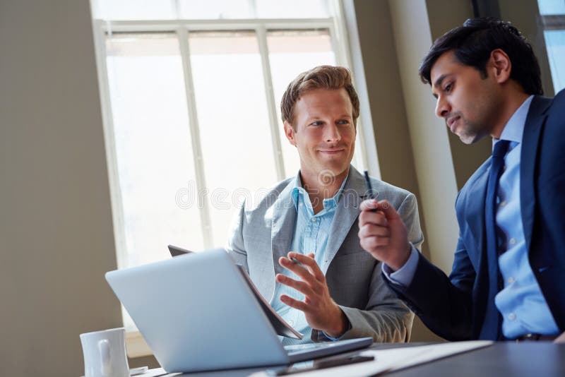 The Deal is Done. Two Businessmen Shaking Hands in the Office. Stock ...