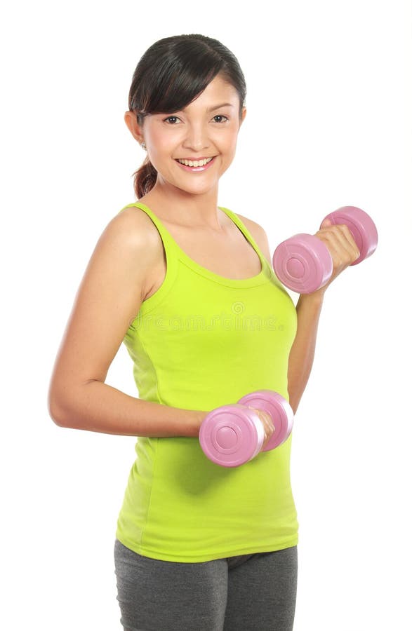 Working out with dumbbells stock image. Image of determination - 23364897