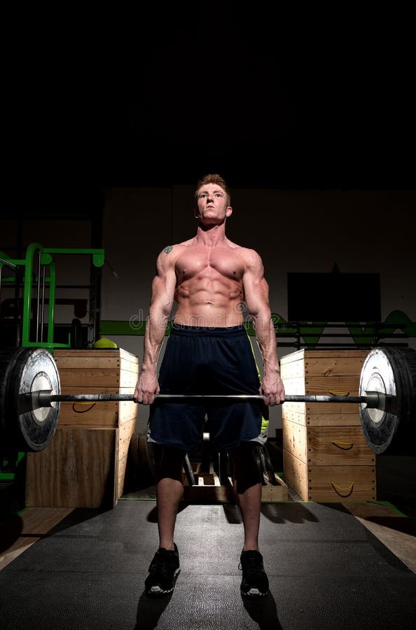 Working Out Hard in Dramatic Light Stock Image - Image of coach ...