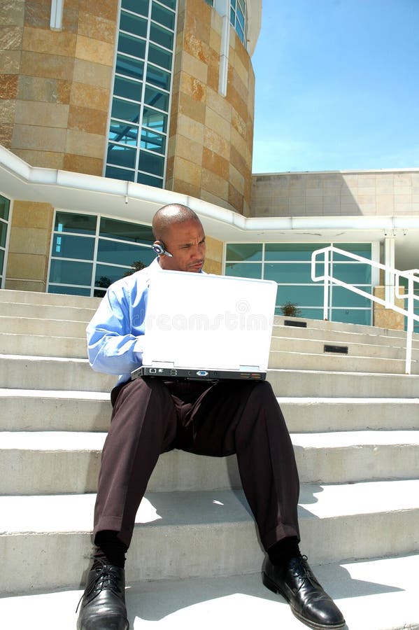 Man on Computer Outside stock photo. Image of gadgets, deal - 676256
