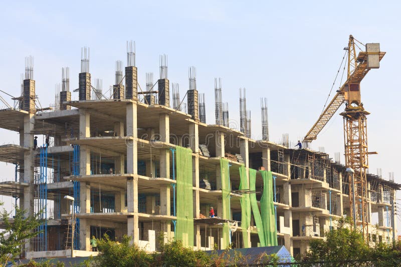 Working on Place with Many Tall Buildings Under Construction and Stock ...