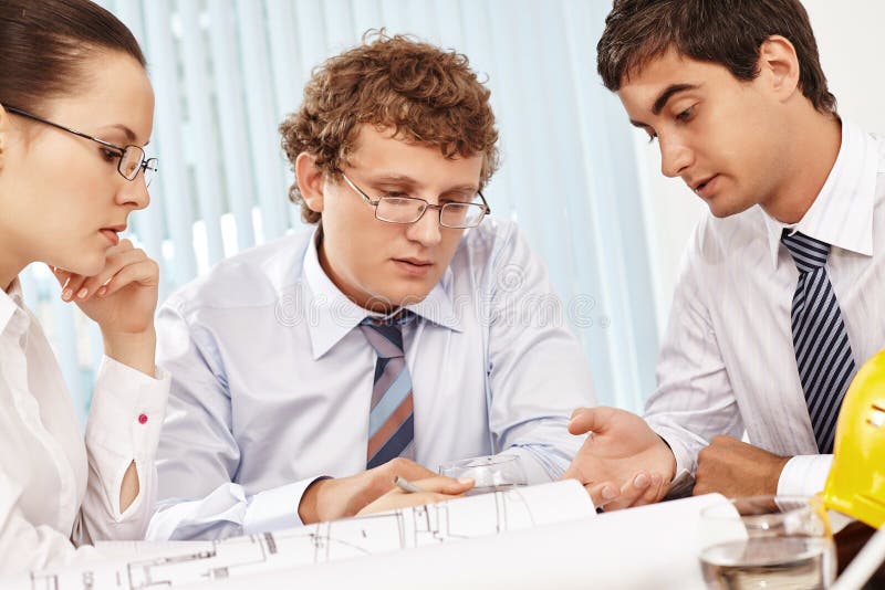 Working on plan stock image. Image of meeting, team, professional ...