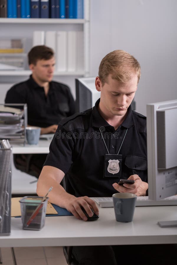 Working at police station stock image. Image of work - 65041947