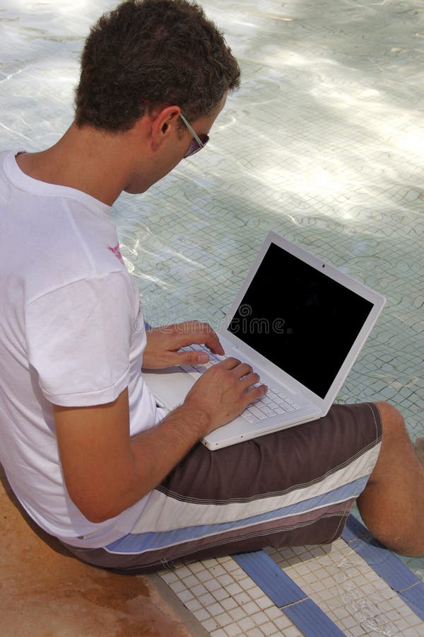 Working by the Pool stock photo. Image of sitting, caucasian - 5551050