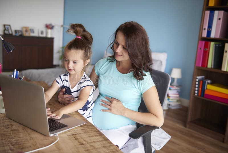 Working pregnant mom stock image. Image of pregnant, indoors - 78984647