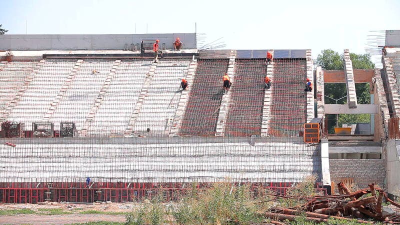 Working Process at a Construction Site. Building Construction. Builders ...