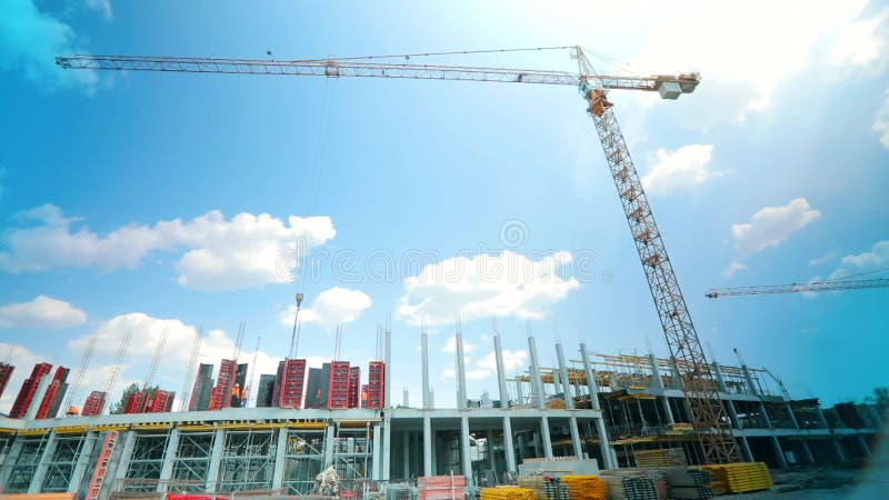Working Process at a Construction Site. Pouring Concrete To a Metal ...