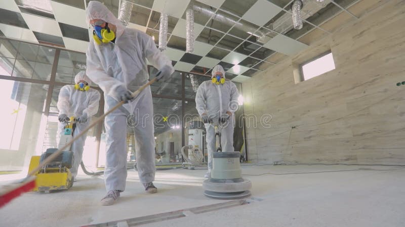 Grinding a Concrete Floor with a Grinder. Concrete Floor Processing ...