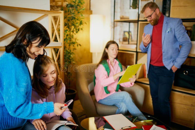 Communication. Two Employees, Man and Woman Talking about Projects Over ...