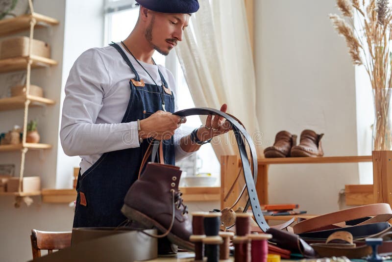 Working Process of the Leather Belt in the Leather Workshop by Skilled Creative Craftsman Stock ...