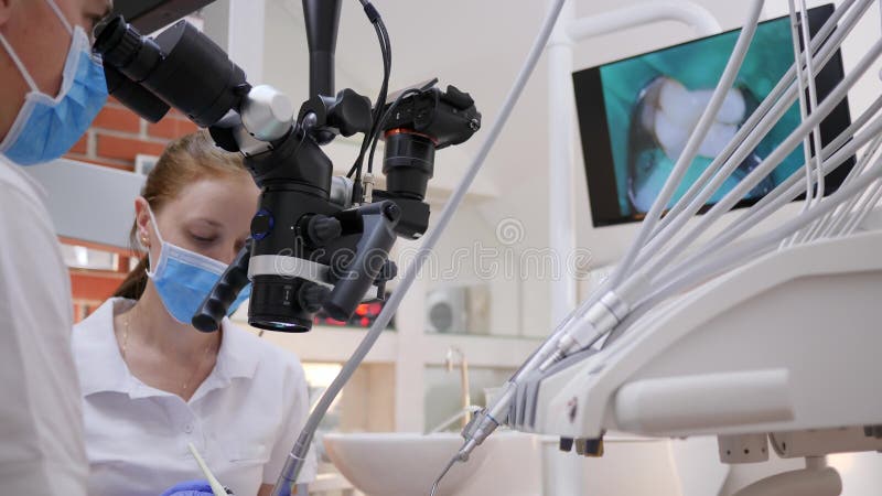 Working Process of Medical Staff with Microscope and Tools in Hospital ...