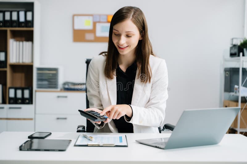 Working Process in Modern Office. Young Woman Account Manager Working ...