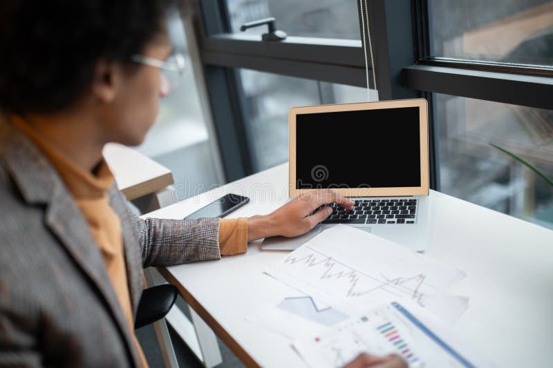 Dark-skinned Businessman Working on the Project and Looking Serious ...