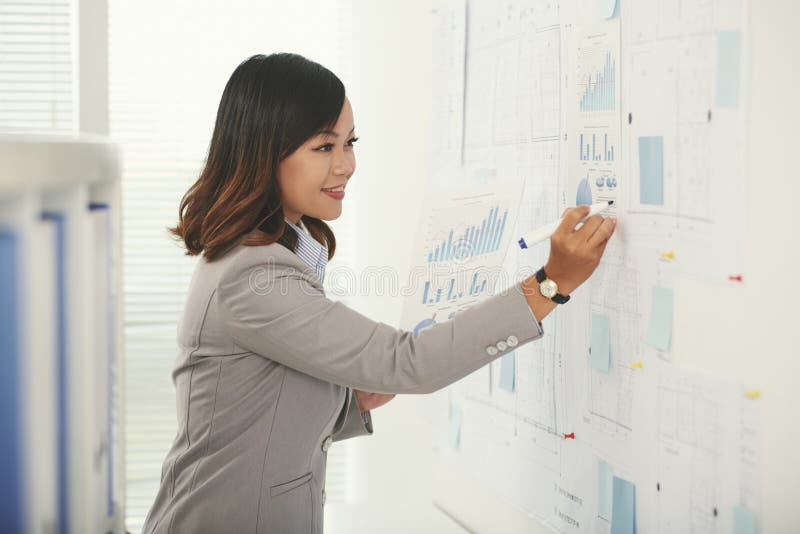 Working on project stock photo. Image of document, writing - 69814184