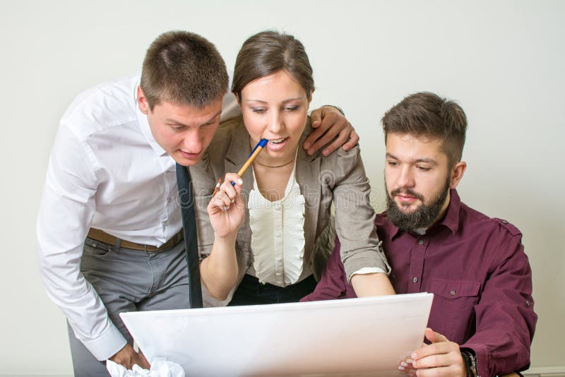 Working on a Project at the Office Stock Photo - Image of colleague ...
