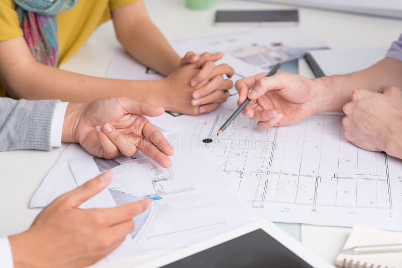 Working on project stock image. Image of discussing, document - 52085445