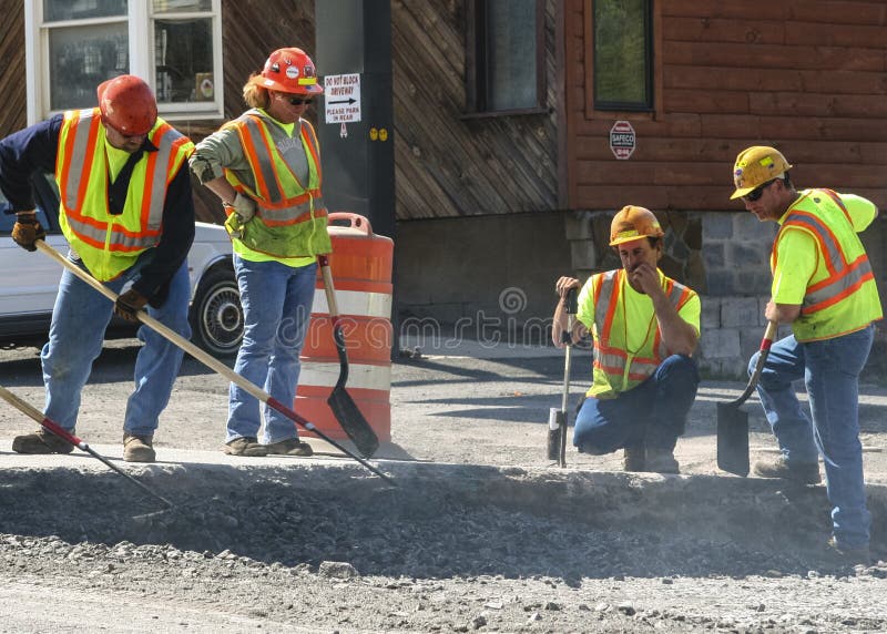 Working on the road editorial image. Image of diversity - 65474860