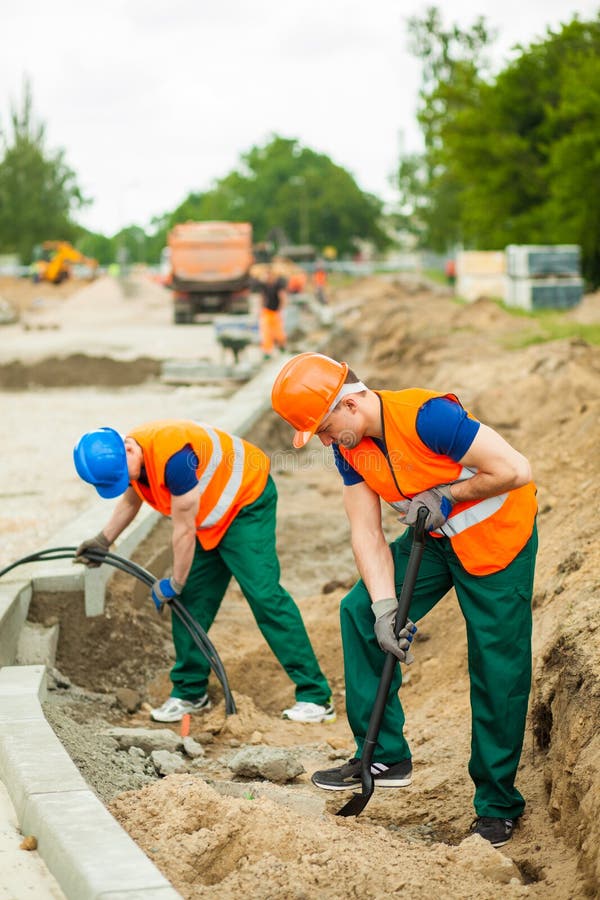 Working on road stock image. Image of person, soil, spade - 67662721