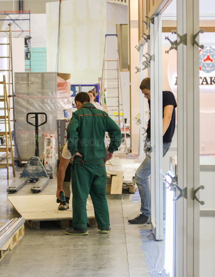 Working with a Screwdriver. Editorial Photography - Image of ladder ...