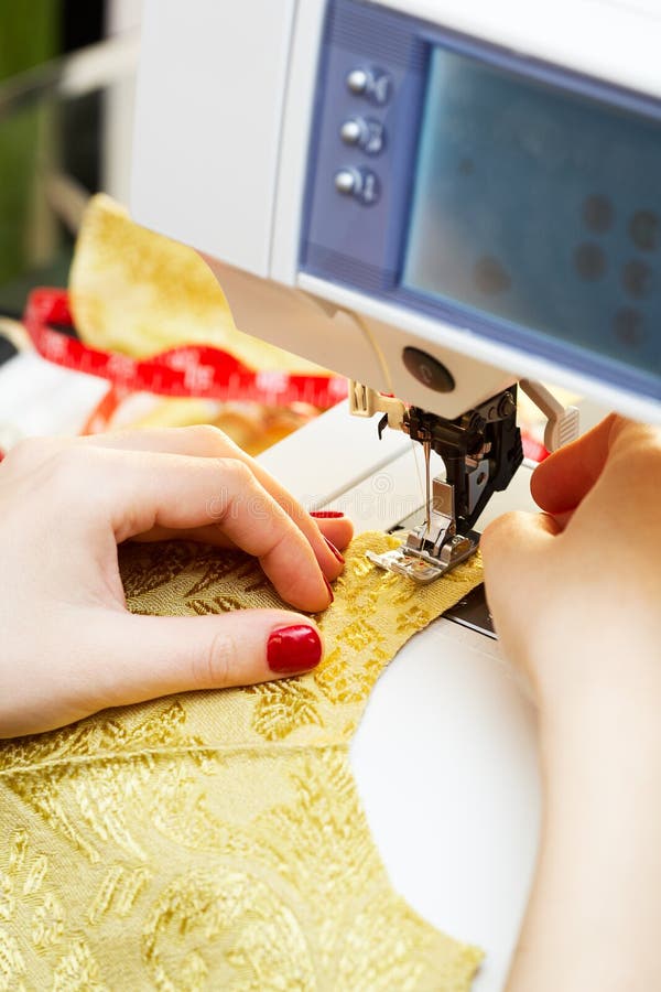 Working on the Sewing Machine Stock Image - Image of creative, industry ...