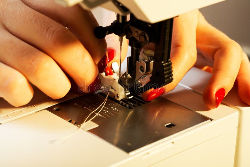 Working on the Sewing Machine Stock Image - Image of join, indoors ...