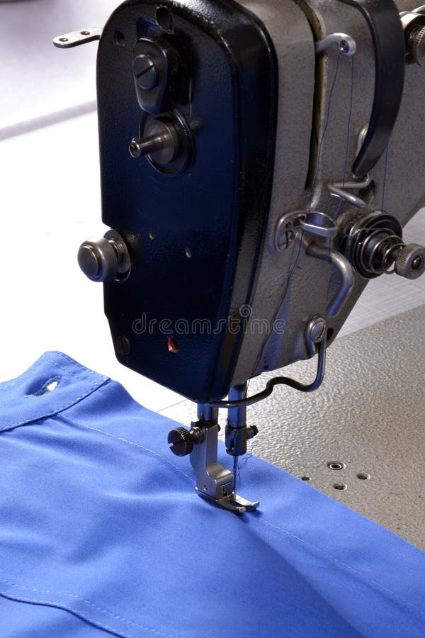 Working on sewing machine. stock photo. Image of dressmaker - 38720298
