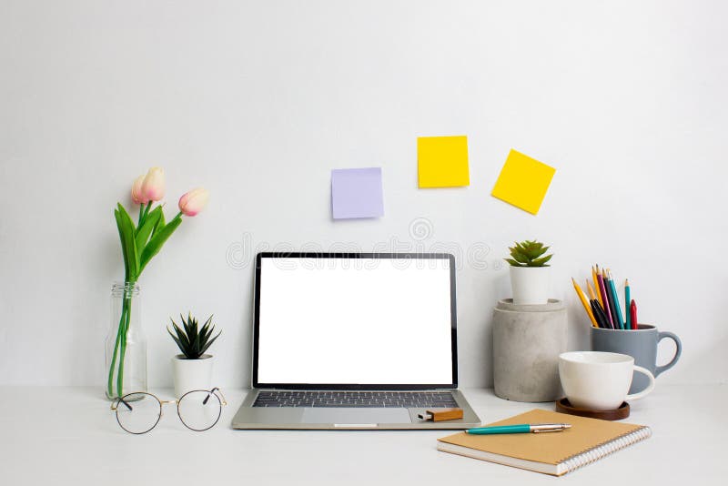 Working Space with Flowers, Candle, Coffee Cup and Books Over the White ...
