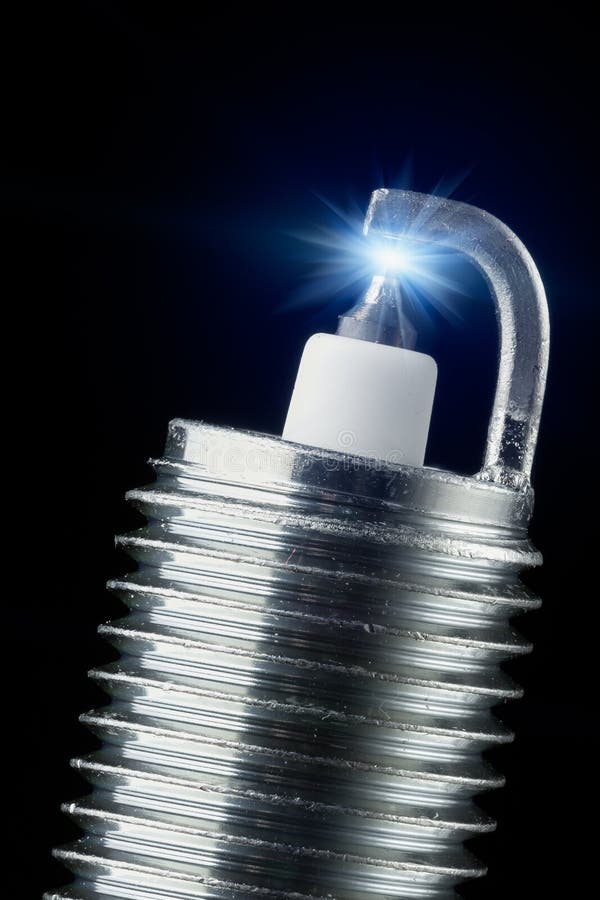 Working Spark Plug with Blue Sparkle Stock Photo - Image of shiny ...