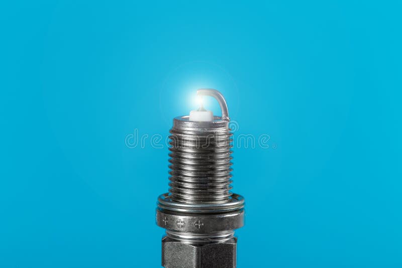 Working Spark Plug with Blue Sparkle Stock Photo - Image of closeup ...