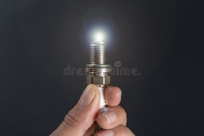 Working Spark Plug with Blue Sparkle Stock Photo - Image of closeup ...