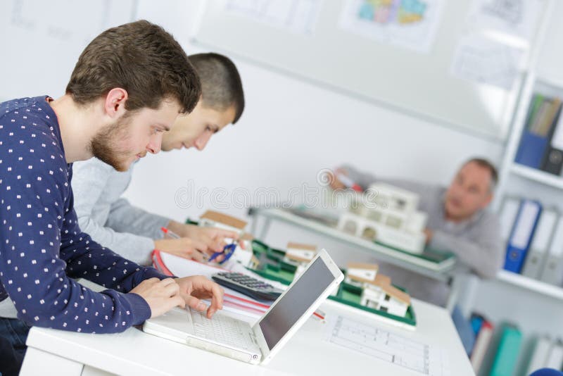 Working Students in Classroom with Laptops Stock Photo - Image of ...