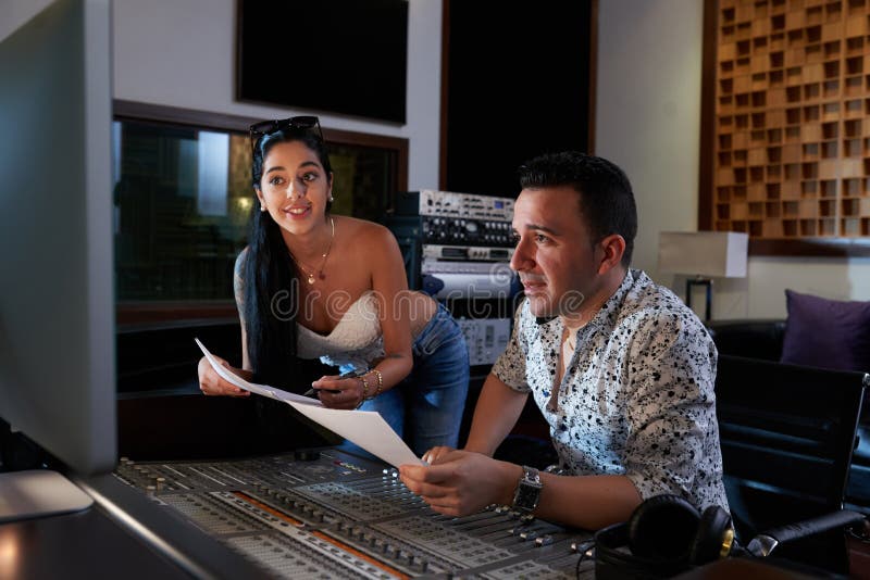 Working in studio stock image. Image of discussing, caucasian - 77641071