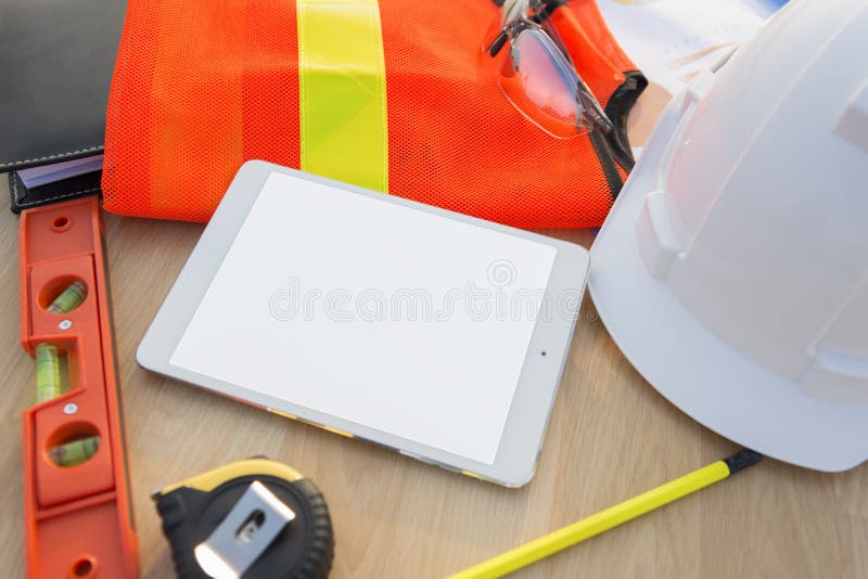 Working Table Engineer with Tablet Stock Photo - Image of helmet ...