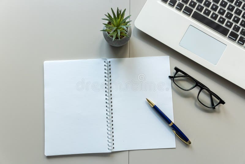 Working Table with Laptop, Empty Notepad Nad Pen on White Desk. Top ...