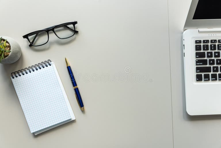 Working Table with Laptop, Empty Notepad Nad Pen on White Desk. Top ...